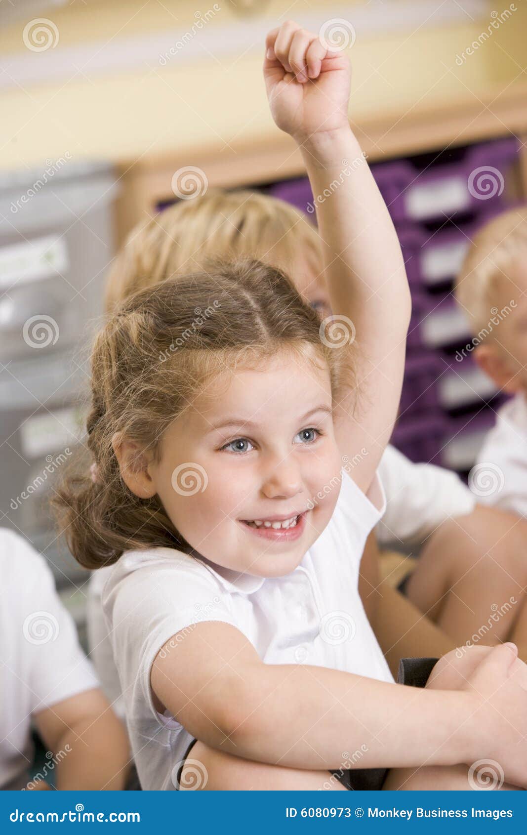 A Schoolgirl Raises Her Hand in a Primary Class Stock Image - Image of ...