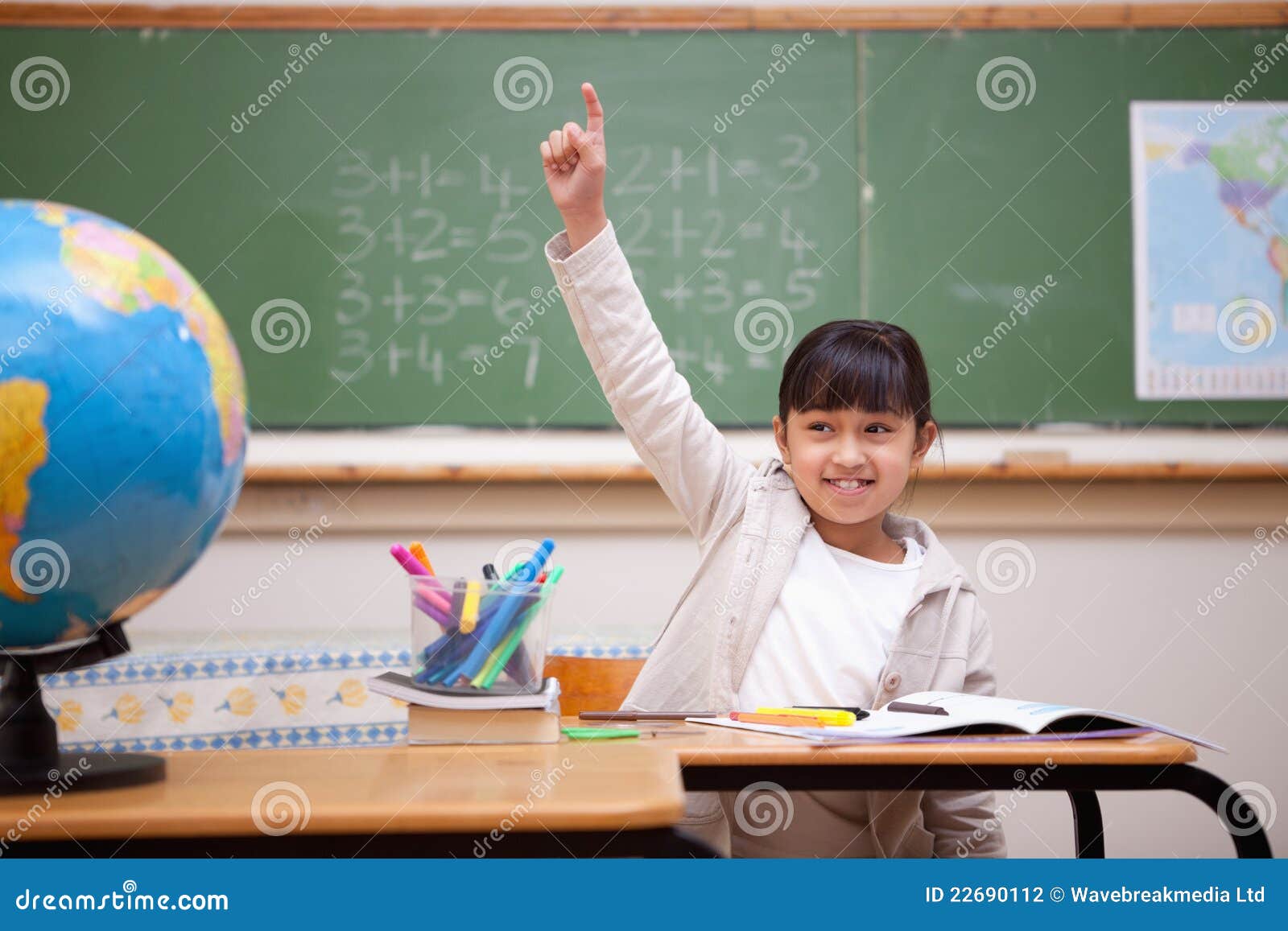 Schoolgirl Raising Her Hand To Answer a Question Stock Photo - Image of ...