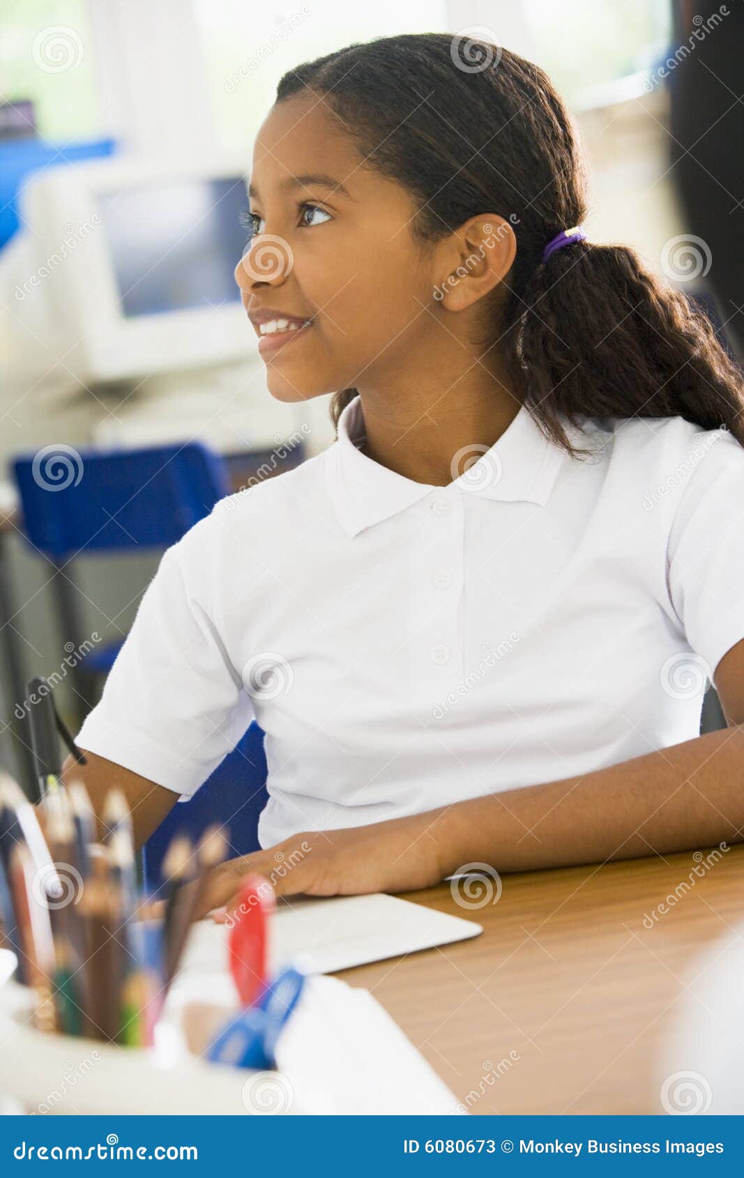 A Schoolgirl Studying in Class Stock Image - Image of attention ...