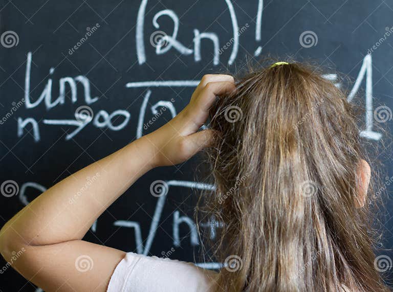 Schoolgirl Thinks on the Difficult Task of Mathematics Stock Photo ...