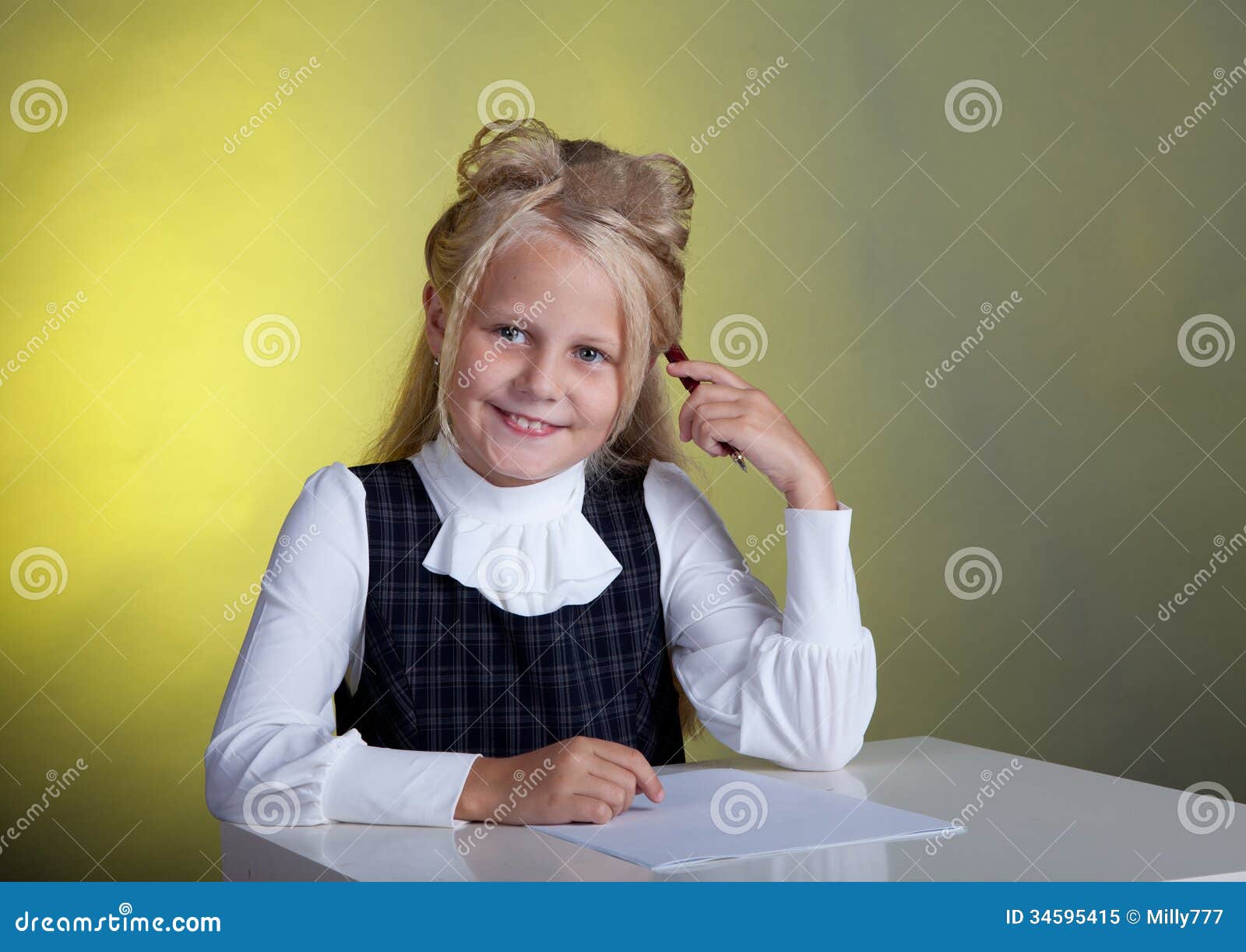 Schoolgirl in School Uniform Writing at the Table. Stock Image - Image ...