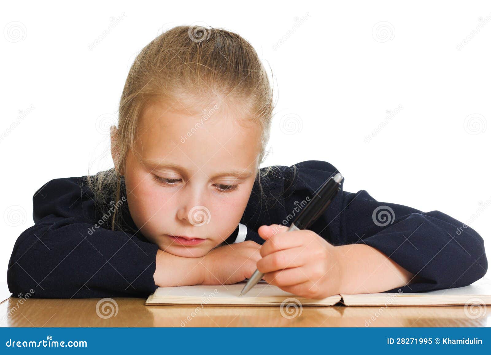 Schoolgirl Writes at a Table Stock Image - Image of childhood ...