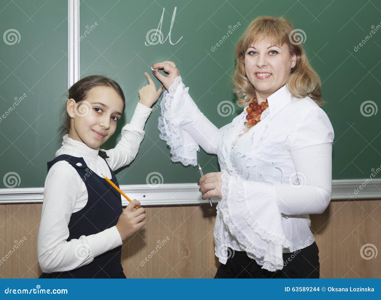 Schoolgirls and teacher stock photo. Image of school - 63589244 Schoolgirls and teacher stock photo. Image of school - 63589244