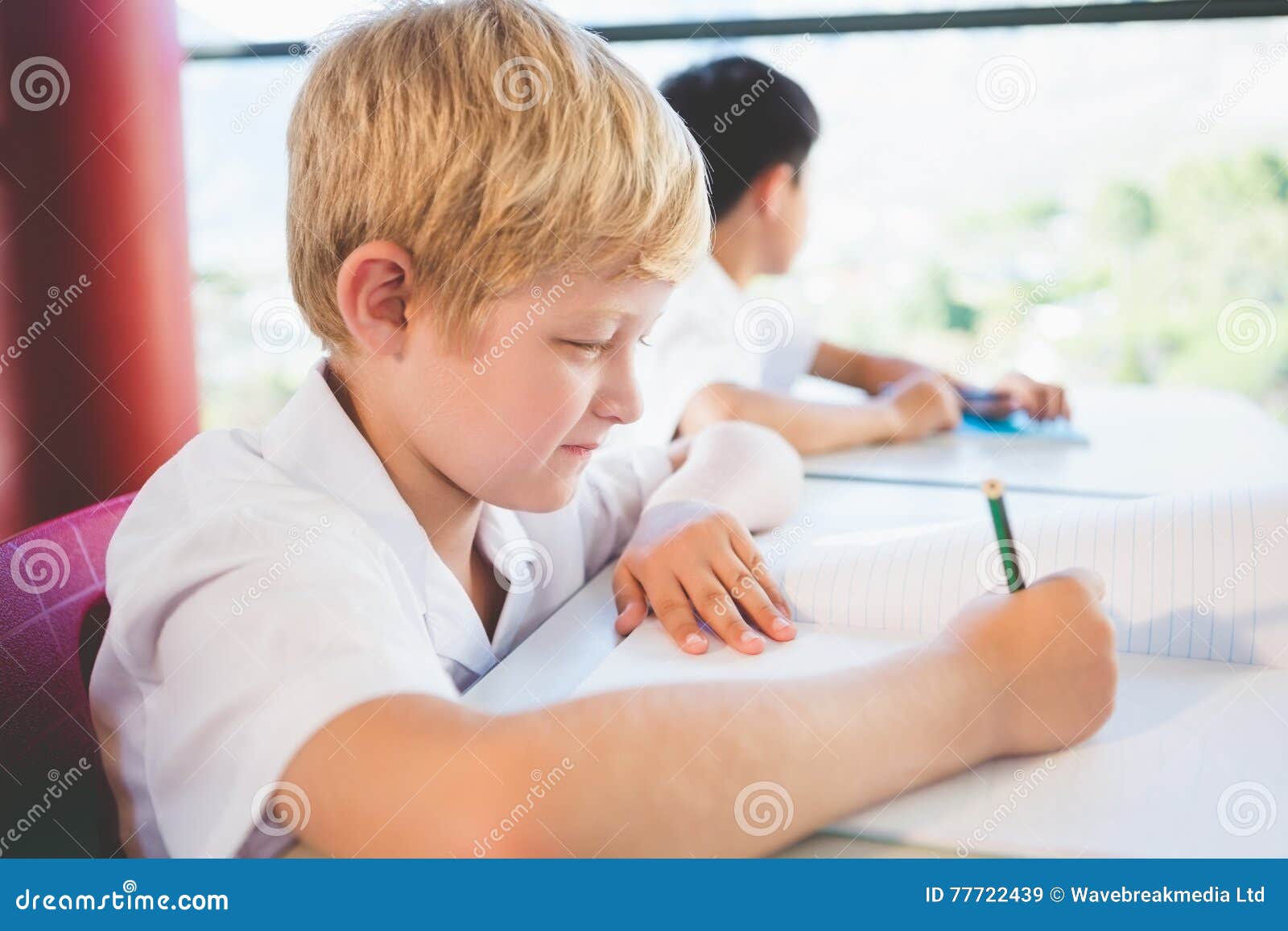 Schoolkid Doing Homework in Classroom Stock Image - Image of blonde ...