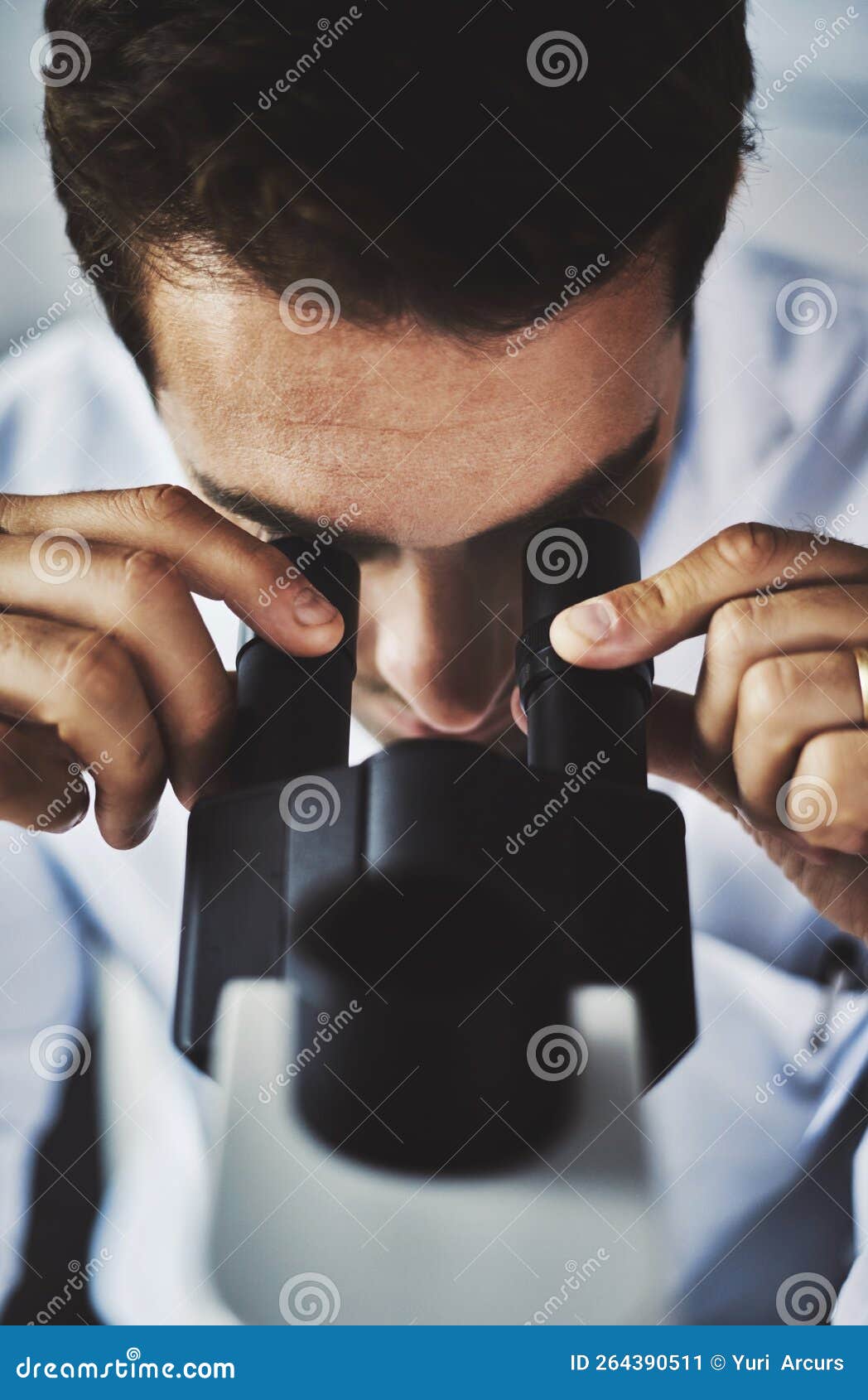 Science is All about Points of View. a Scientist Using a Microscope in ...