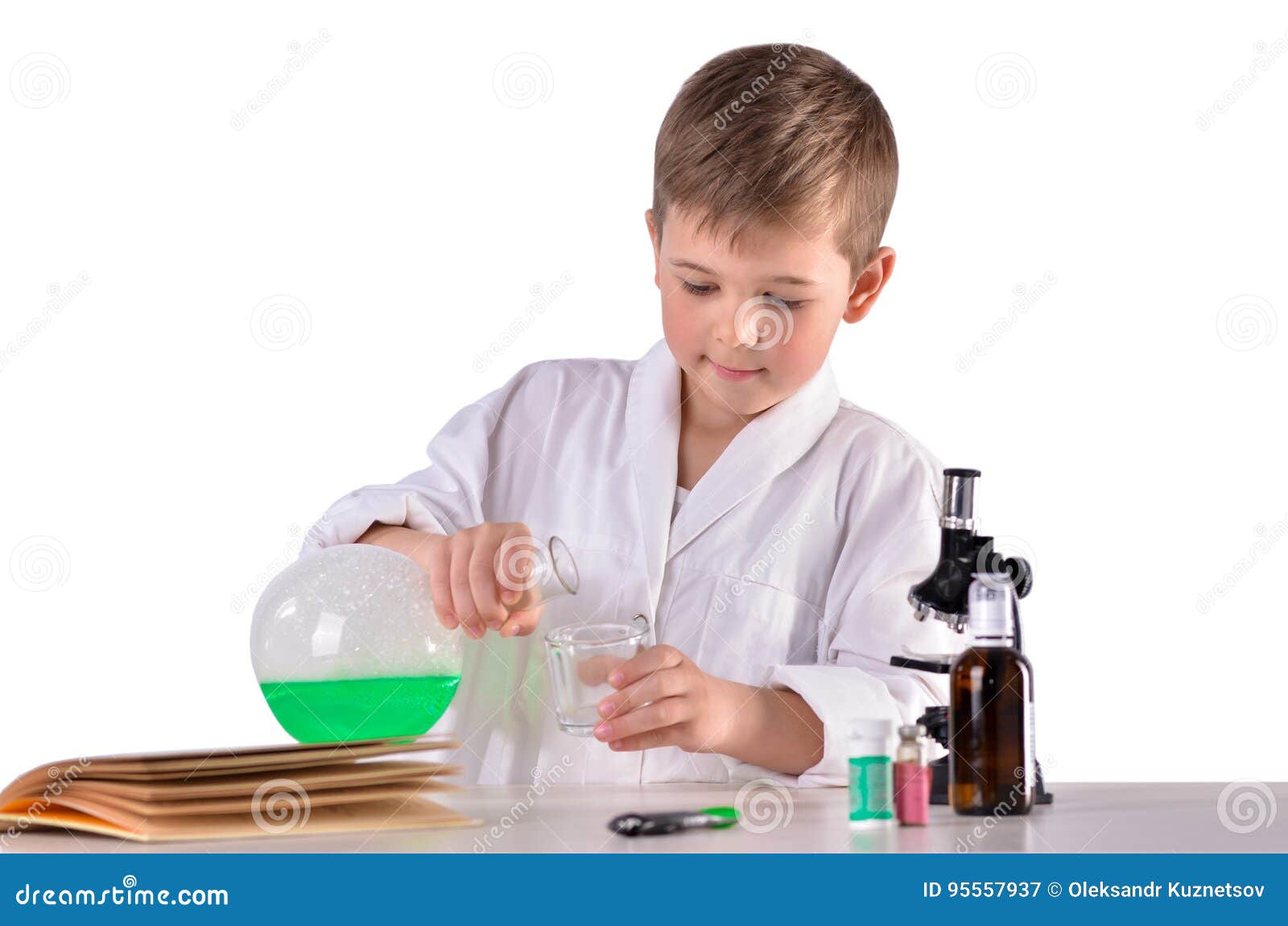 Science Boy Pours Green Liquid from Flask into Glass Stock Image ...