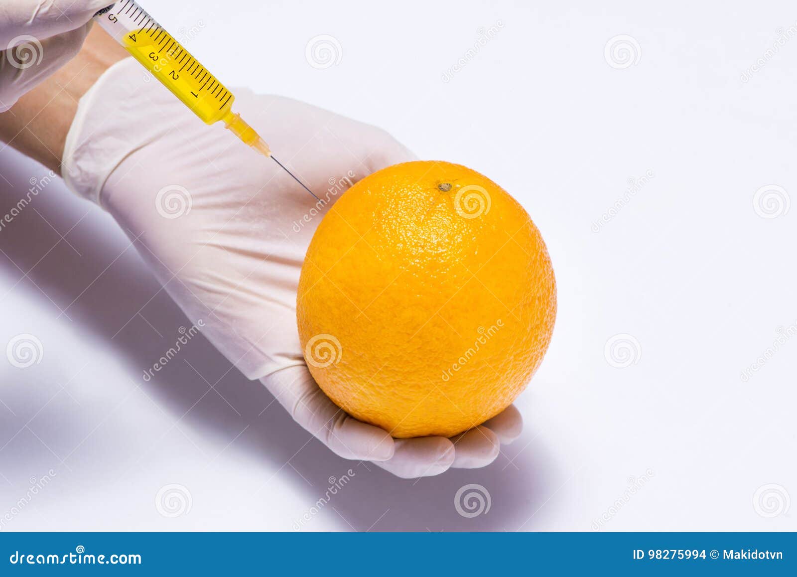 Science Experiment with Orange and Syringe Isolated on White. Stock ...