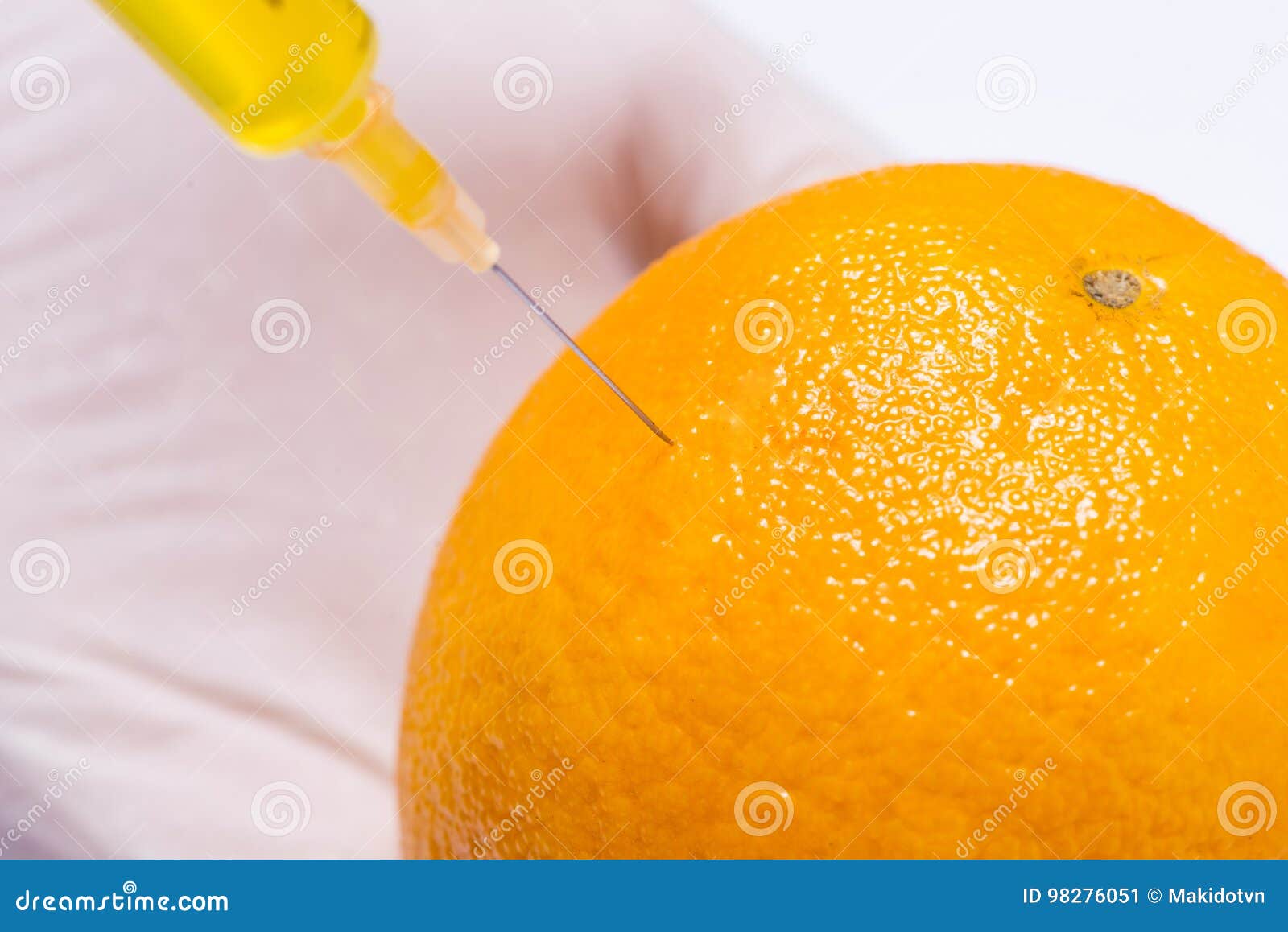 Science Experiment with Orange and Syringe Isolated on White. Stock ...