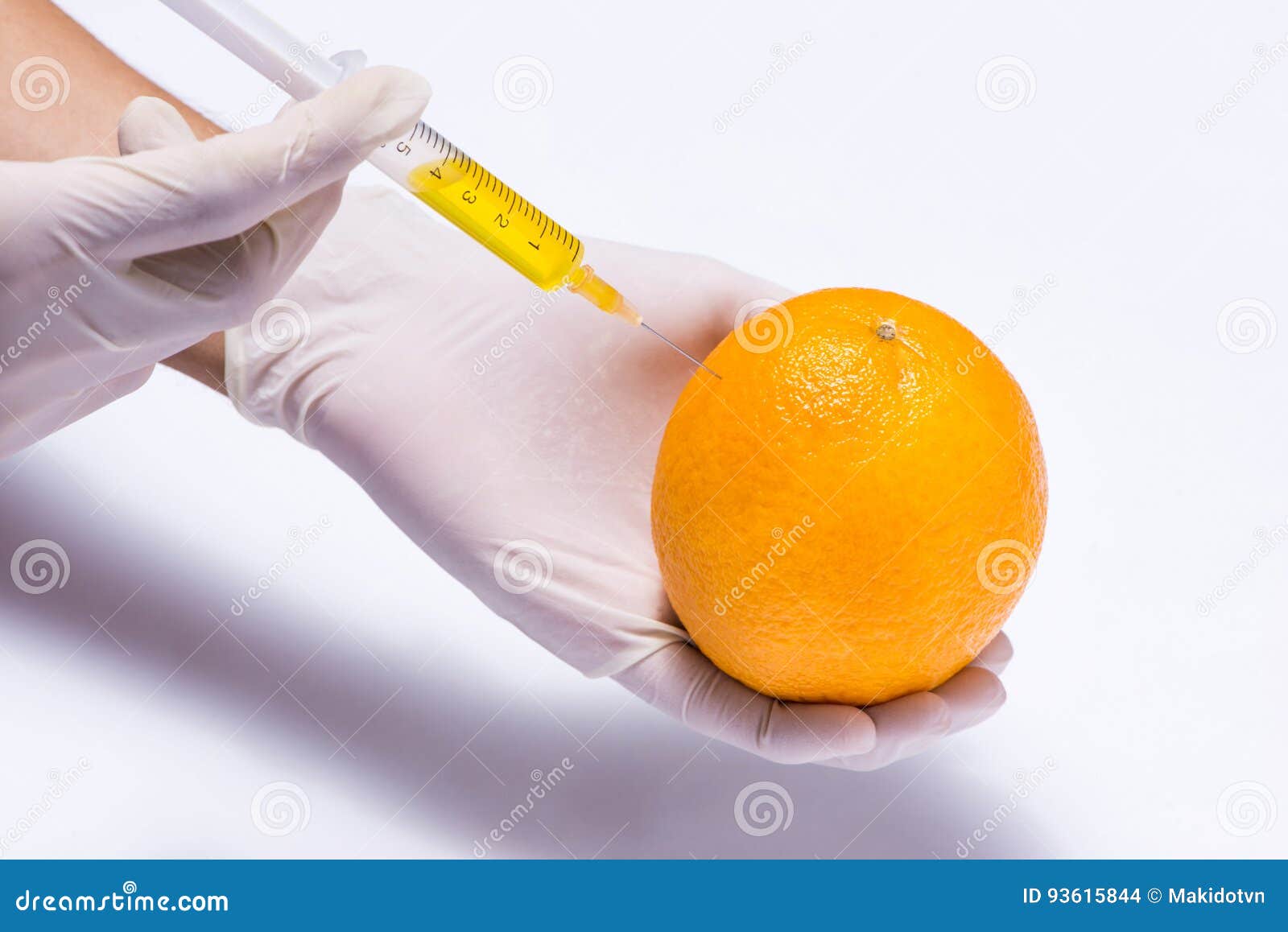 GMO. Experiment On The Orange. Bioengineering Food, Genetically ...