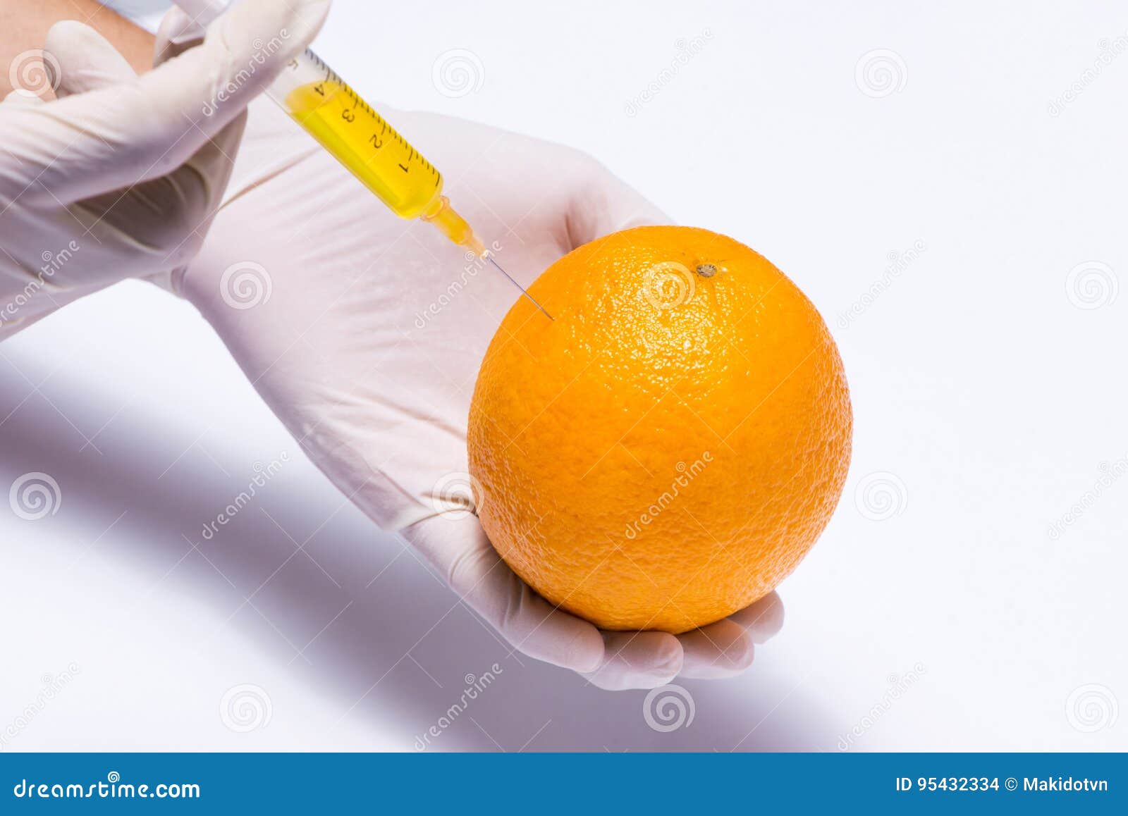 Science Experiment with Orange and Syringe on White. Stock Photo ...