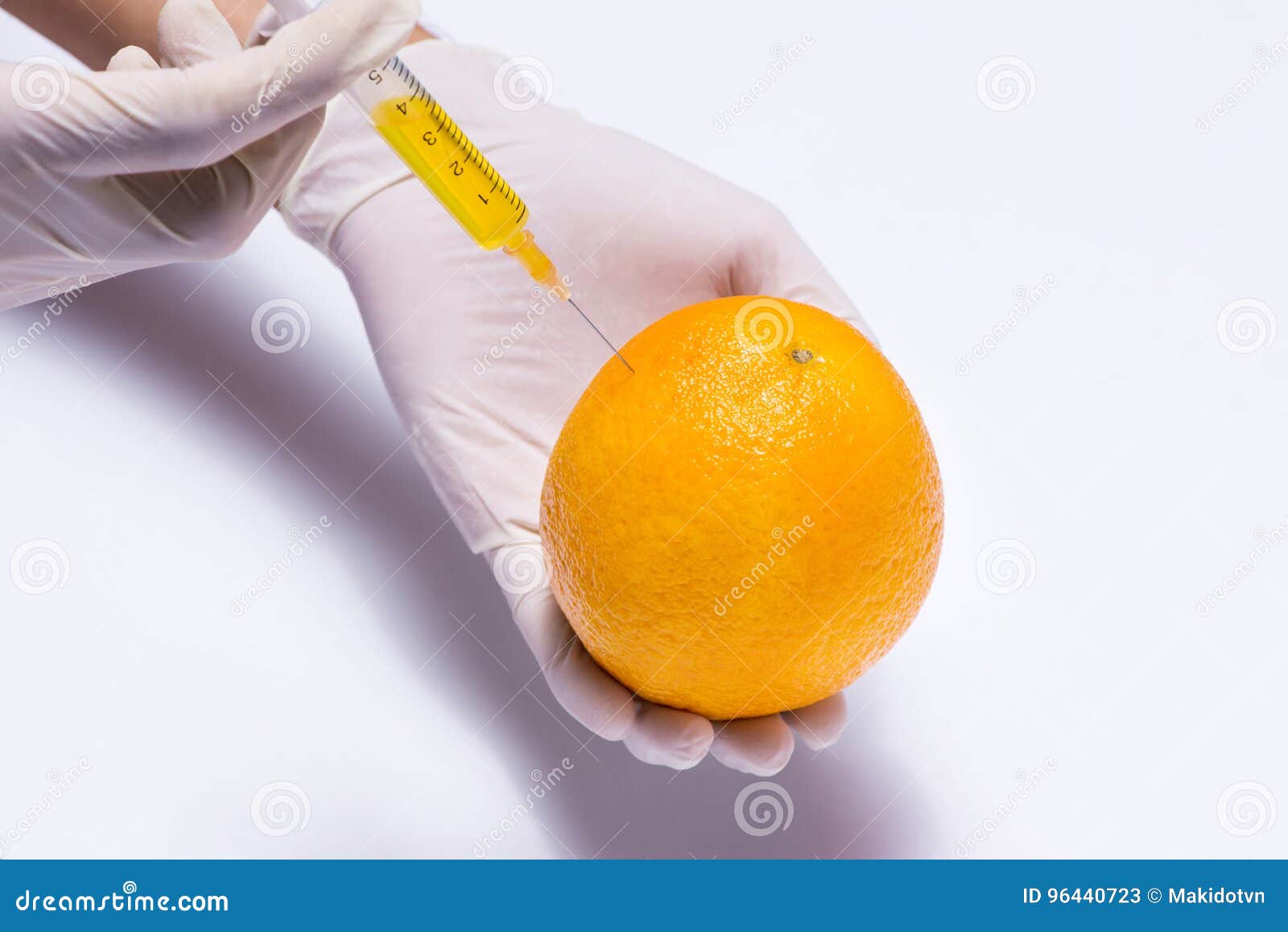 Science Experiment with Orange and Syringe on White. Stock Image ...