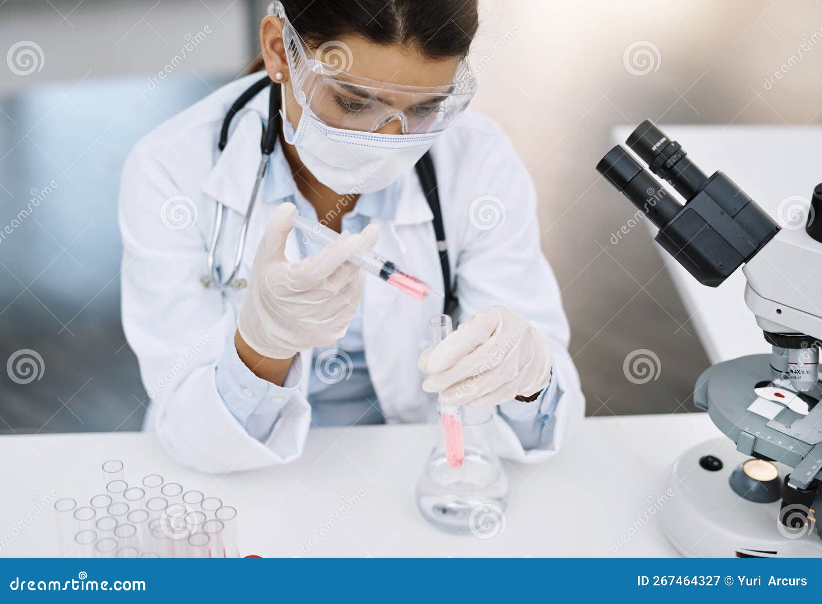 Science is Filled with Many Curiosities. a Young Scientist Working in a ...