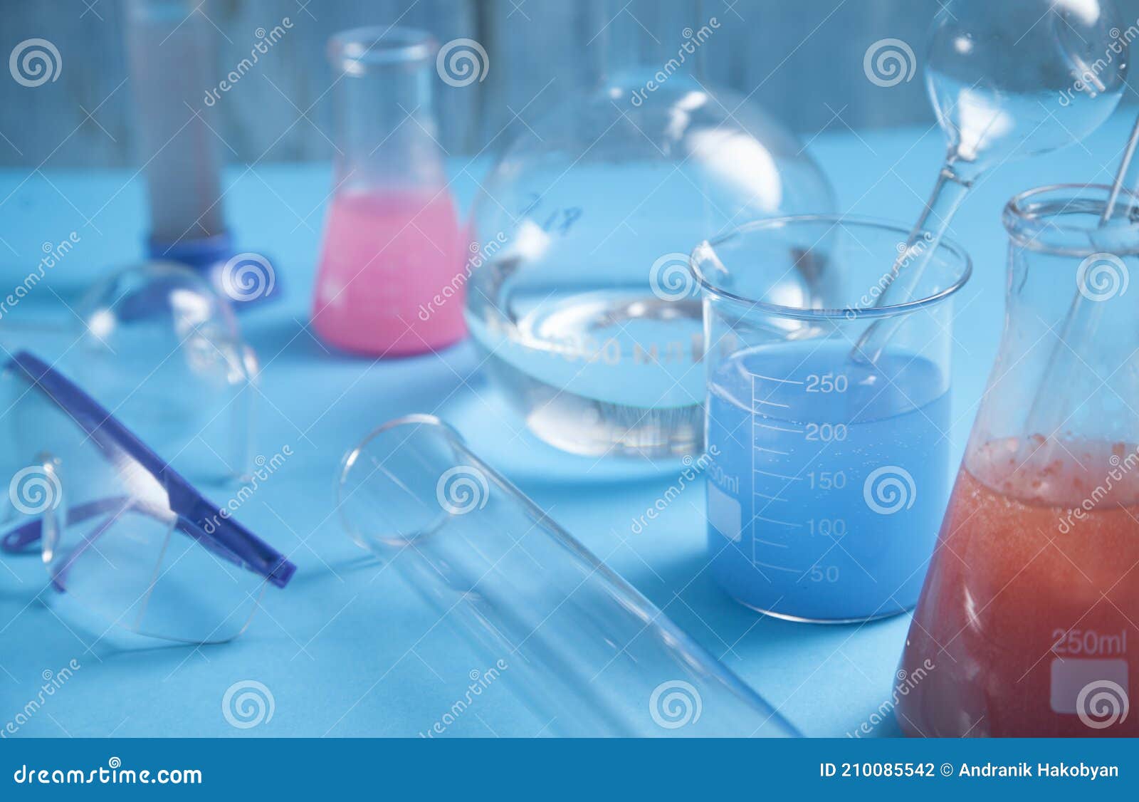 Science Glassware with Colored Liquid and Glasses Stock Photo - Image ...