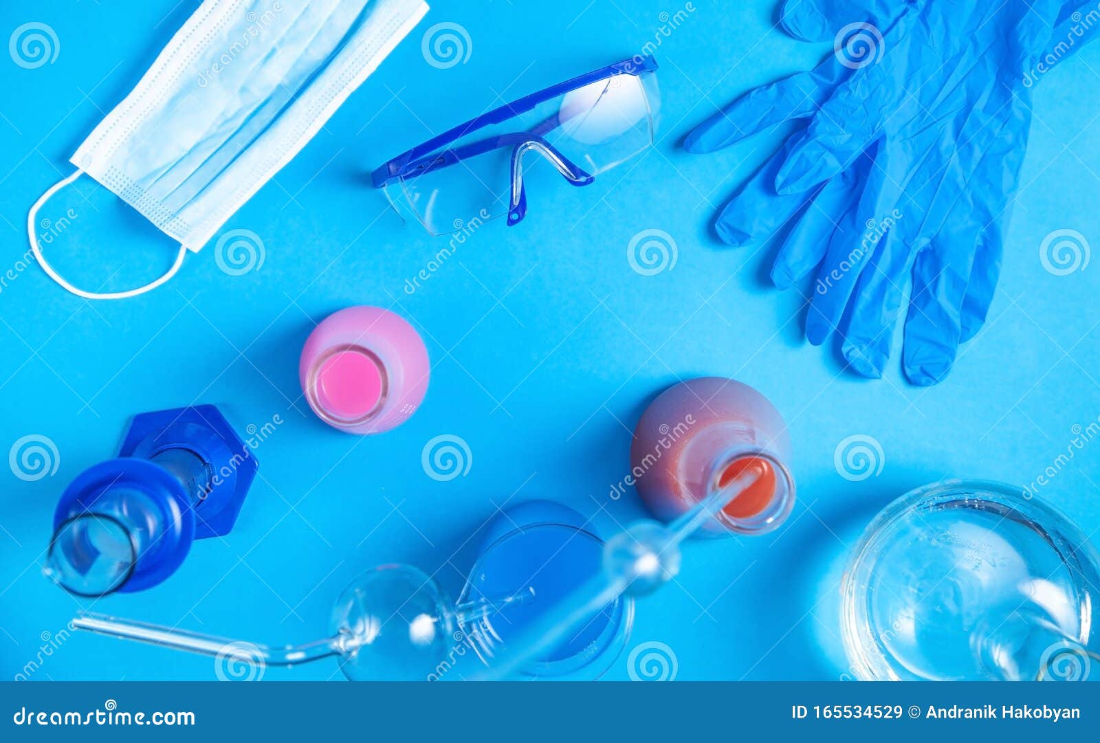 Science Glassware with Colored Liquid Gloves and Glasses Stock Image ...