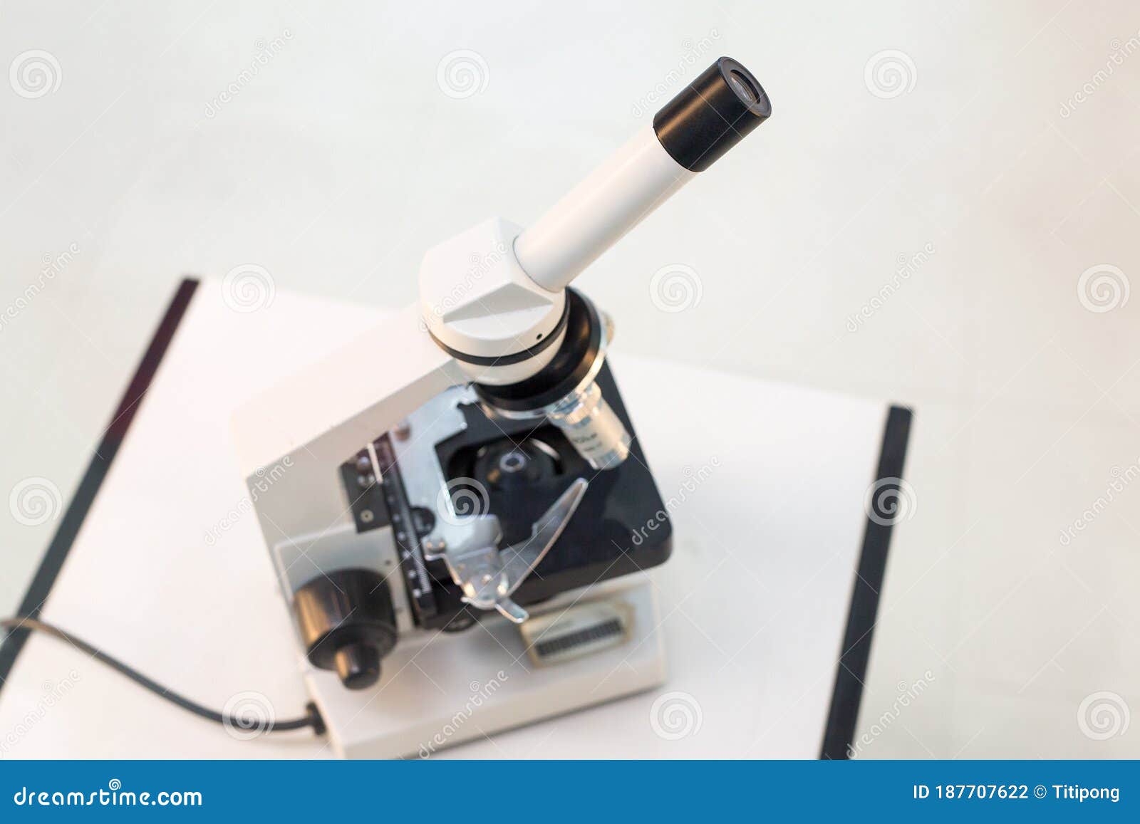 In a Science Lab with a Microscope Stock Photo - Image of hands ...
