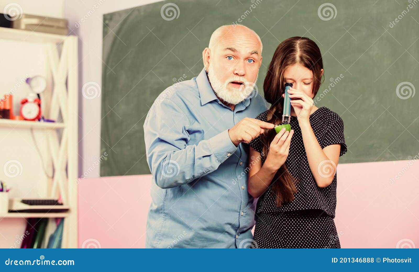 Science Lab. Small Girl Explore Fruit Slice. School. Microscopy ...