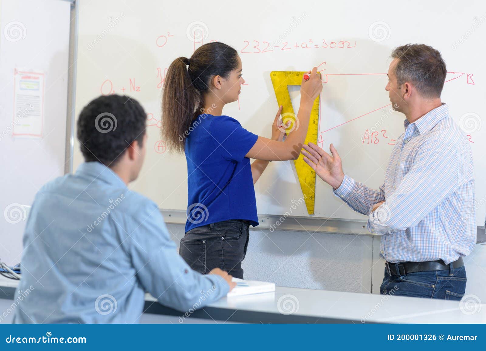 Science Professor and Student Writing on Board Stock Photo - Image of ...