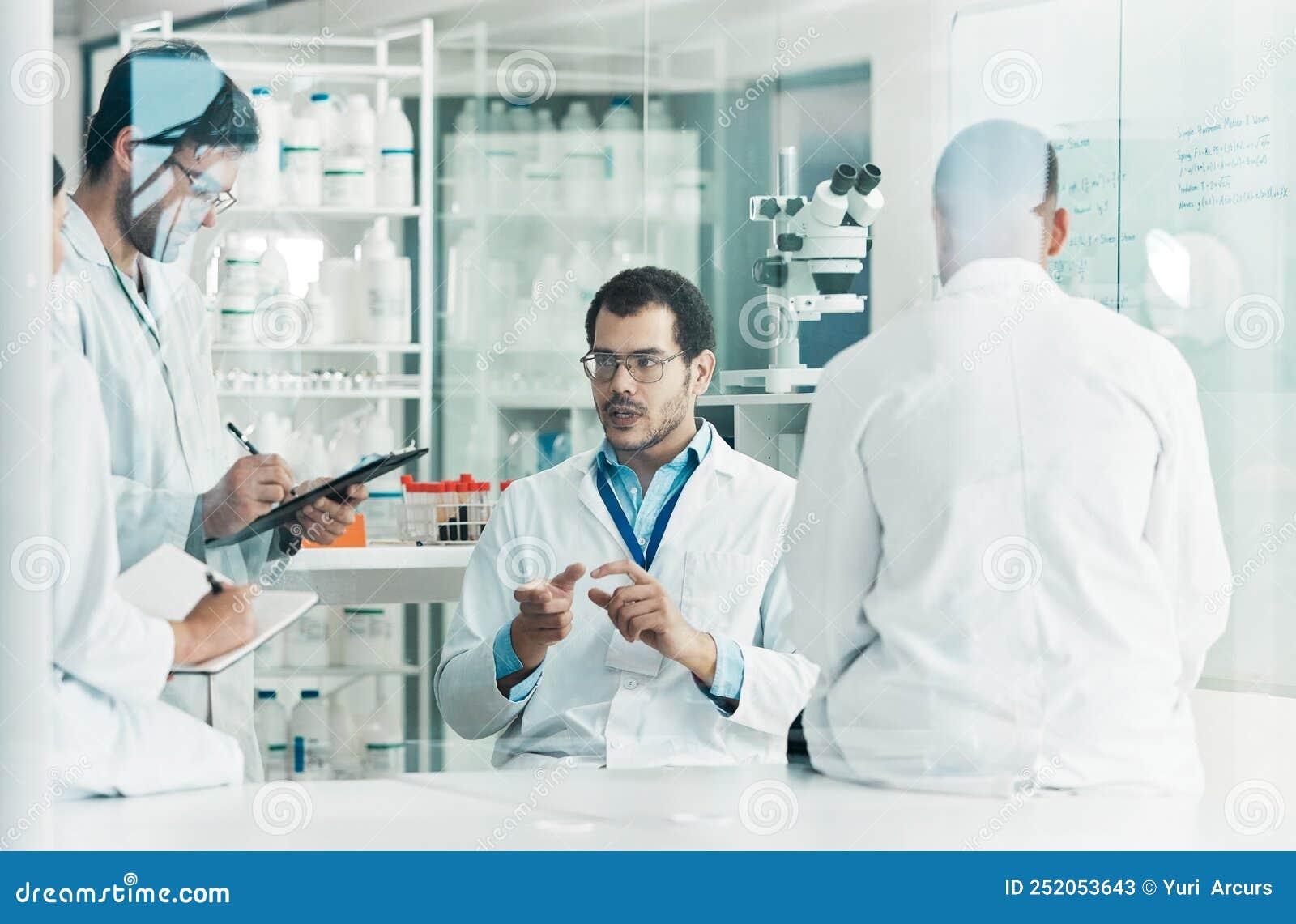 Science Promotes Great Discovery and Learning. a Group of Scientists ...