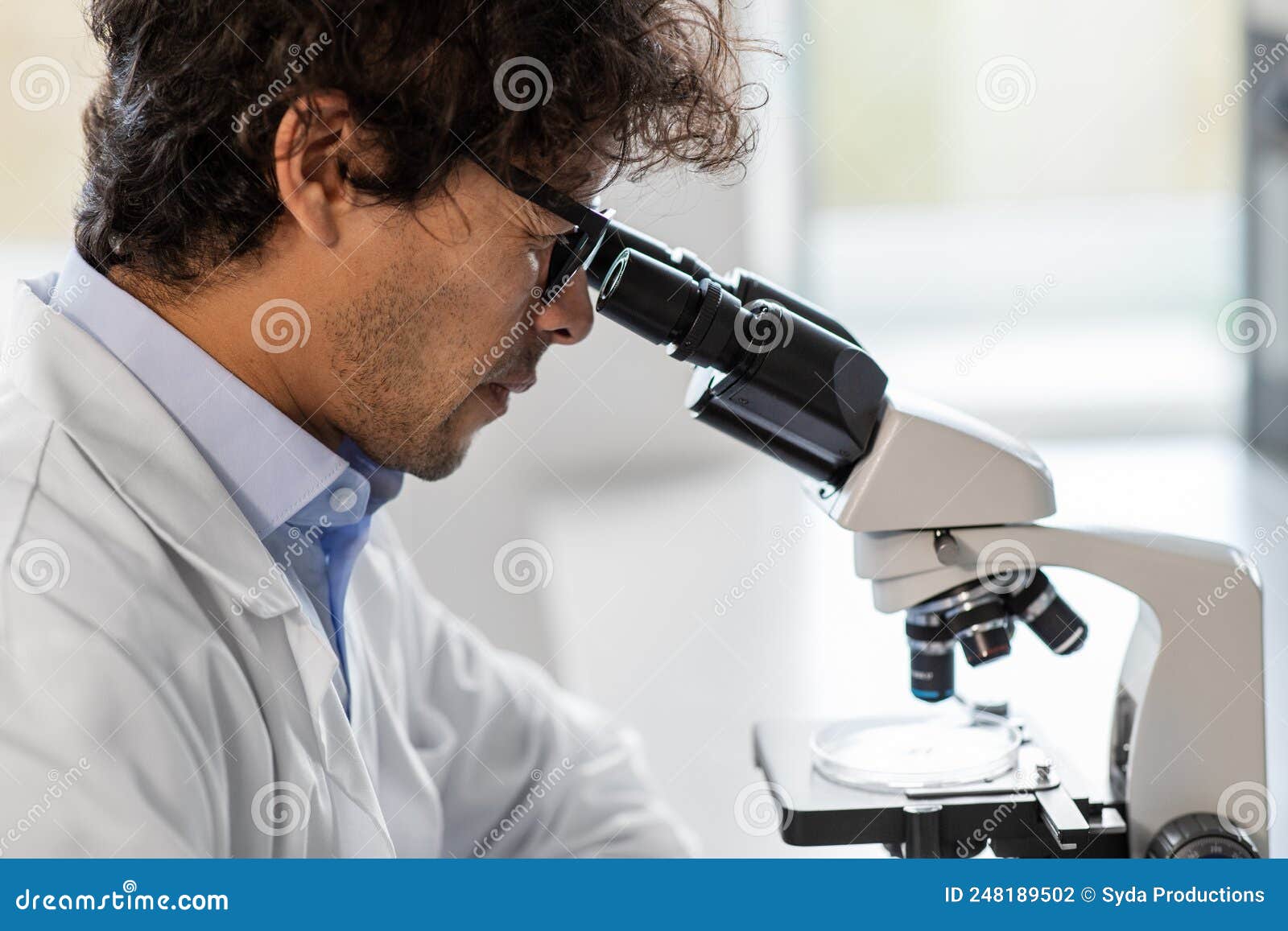Scientist with Microscope Working in Laboratory Stock Photo - Image of ...