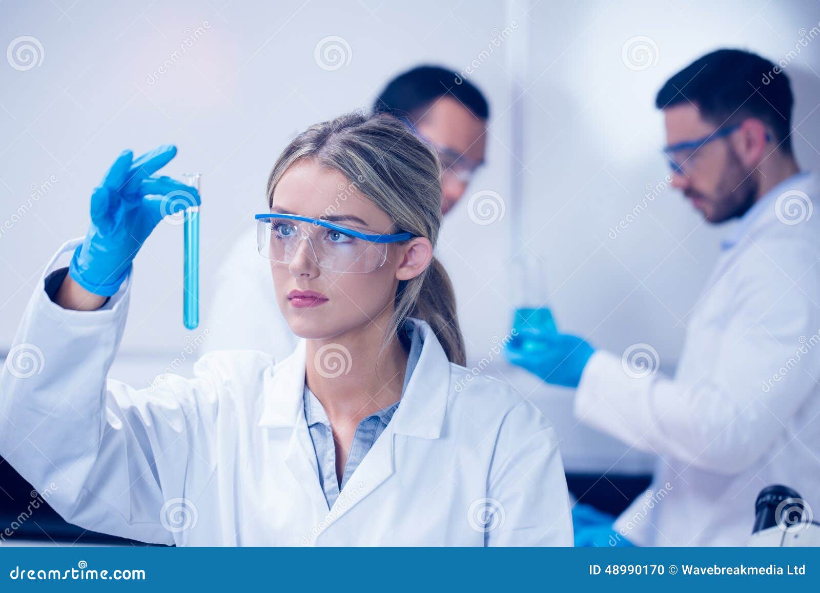 Science Student Holding Up Test Tube Stock Photo - Image of education ...
