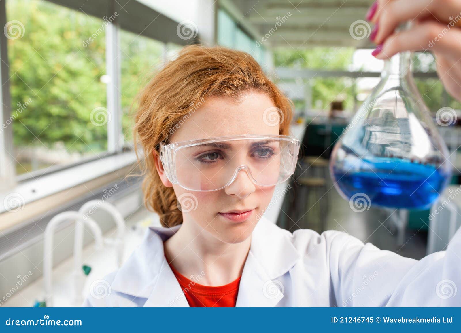 Science Student Looking at a Flask Stock Image - Image of medical ...