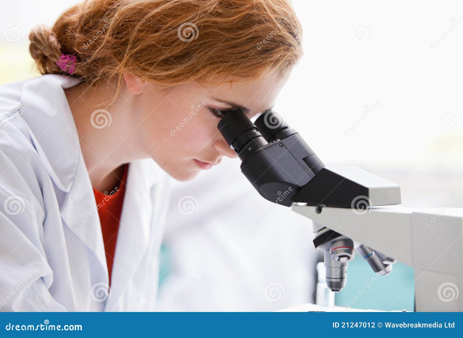 A Science Student Looking into a Microscope Stock Photo - Image of ...