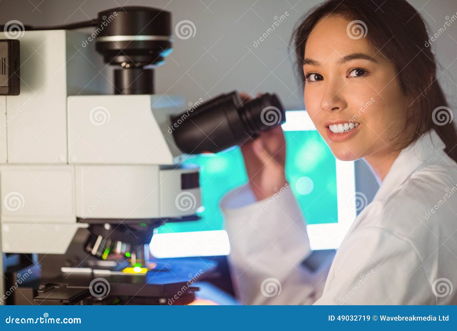 Science Student Looking through Microscope Stock Image - Image of side ...