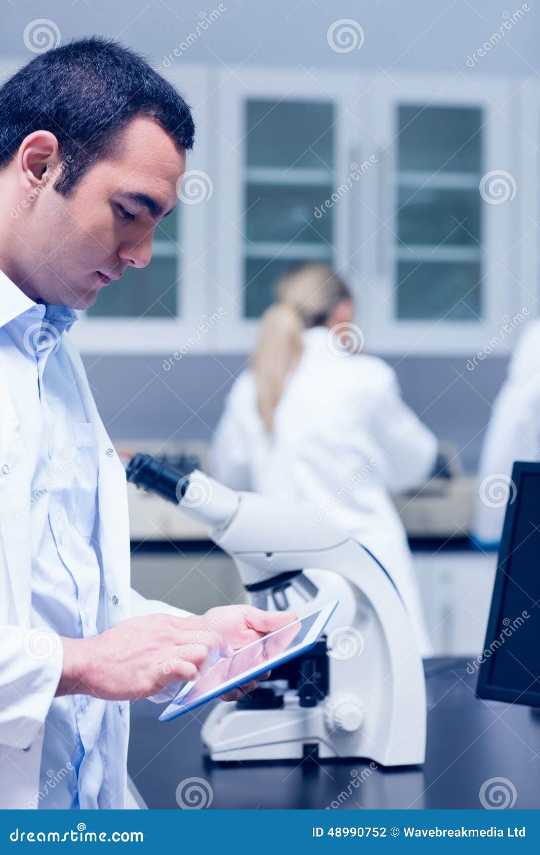 Science Student Working with Microscope in the Lab Stock Photo - Image ...