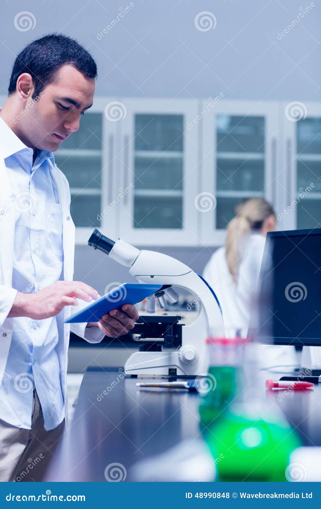 Science Student Working with Microscope in the Lab Stock Photo - Image ...