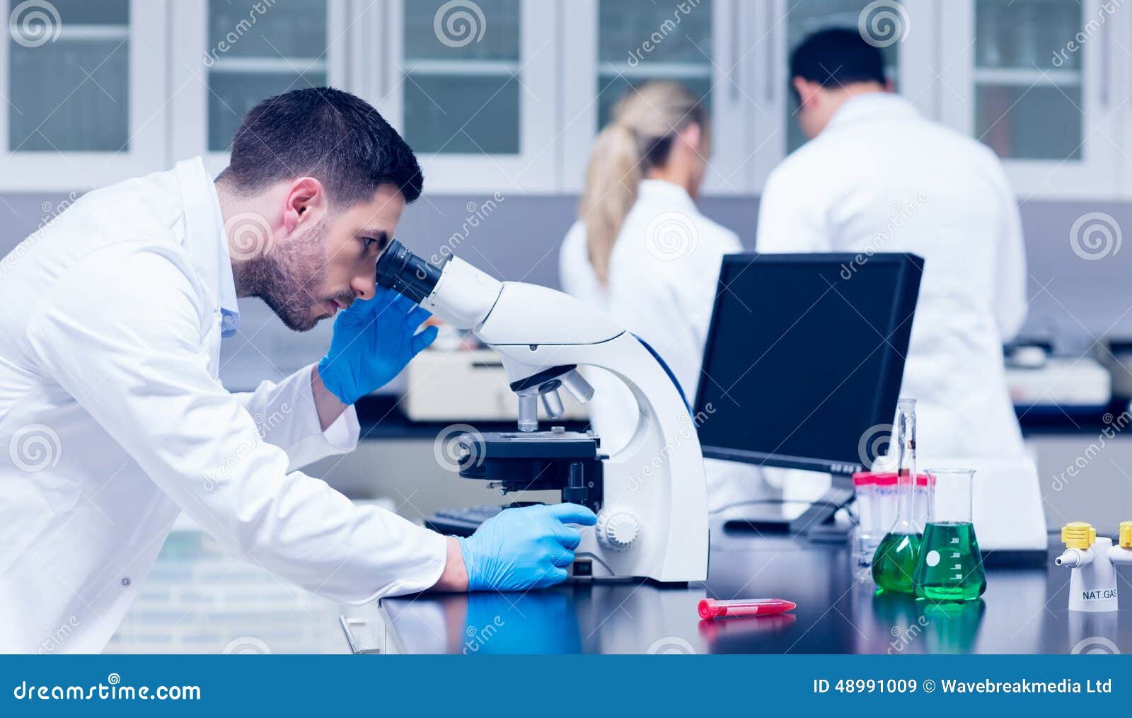 Science Student Working with Microscope in the Lab Stock Image - Image ...