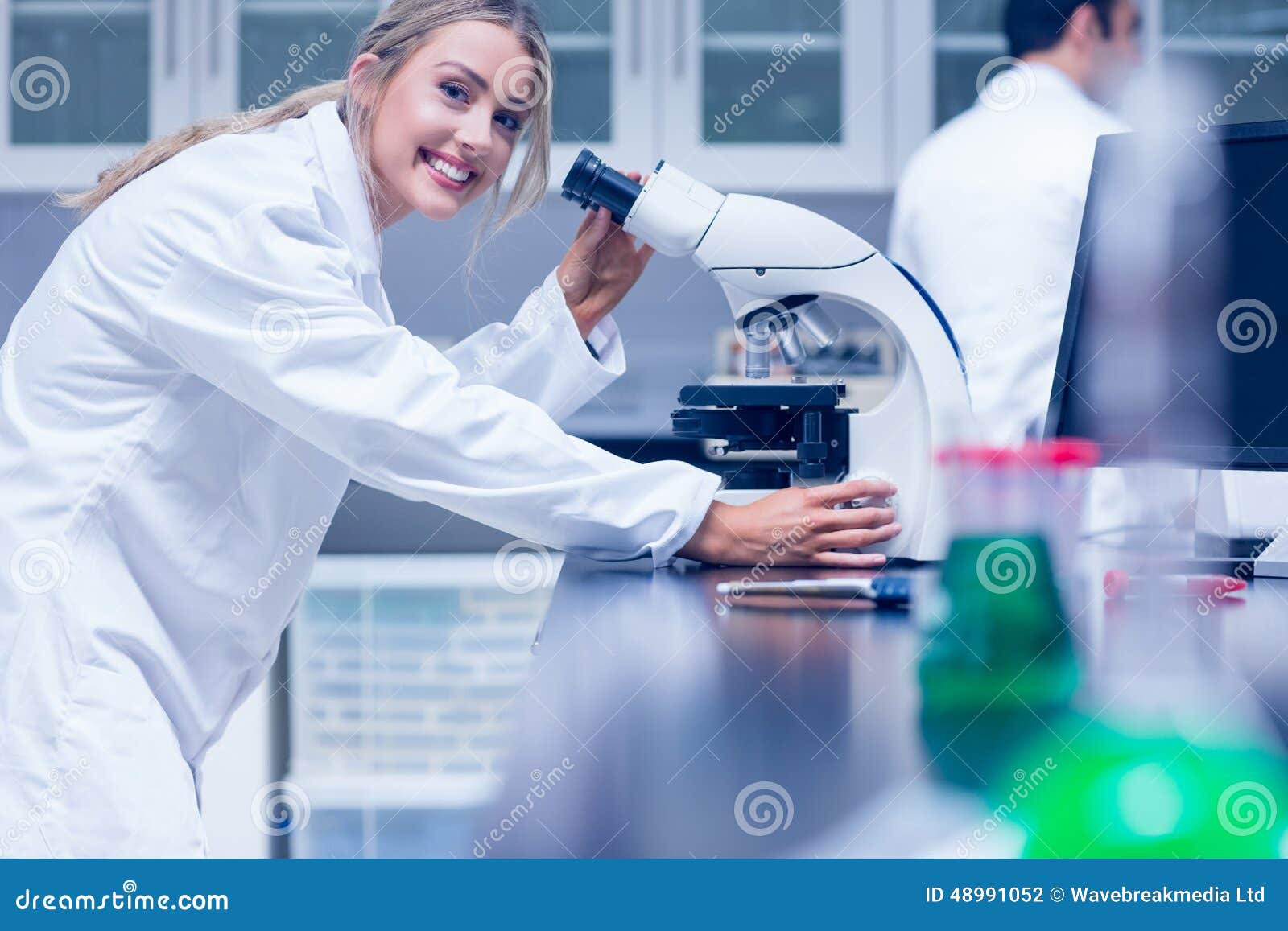 Science Student Working with Microscope in the Lab Stock Photo - Image ...