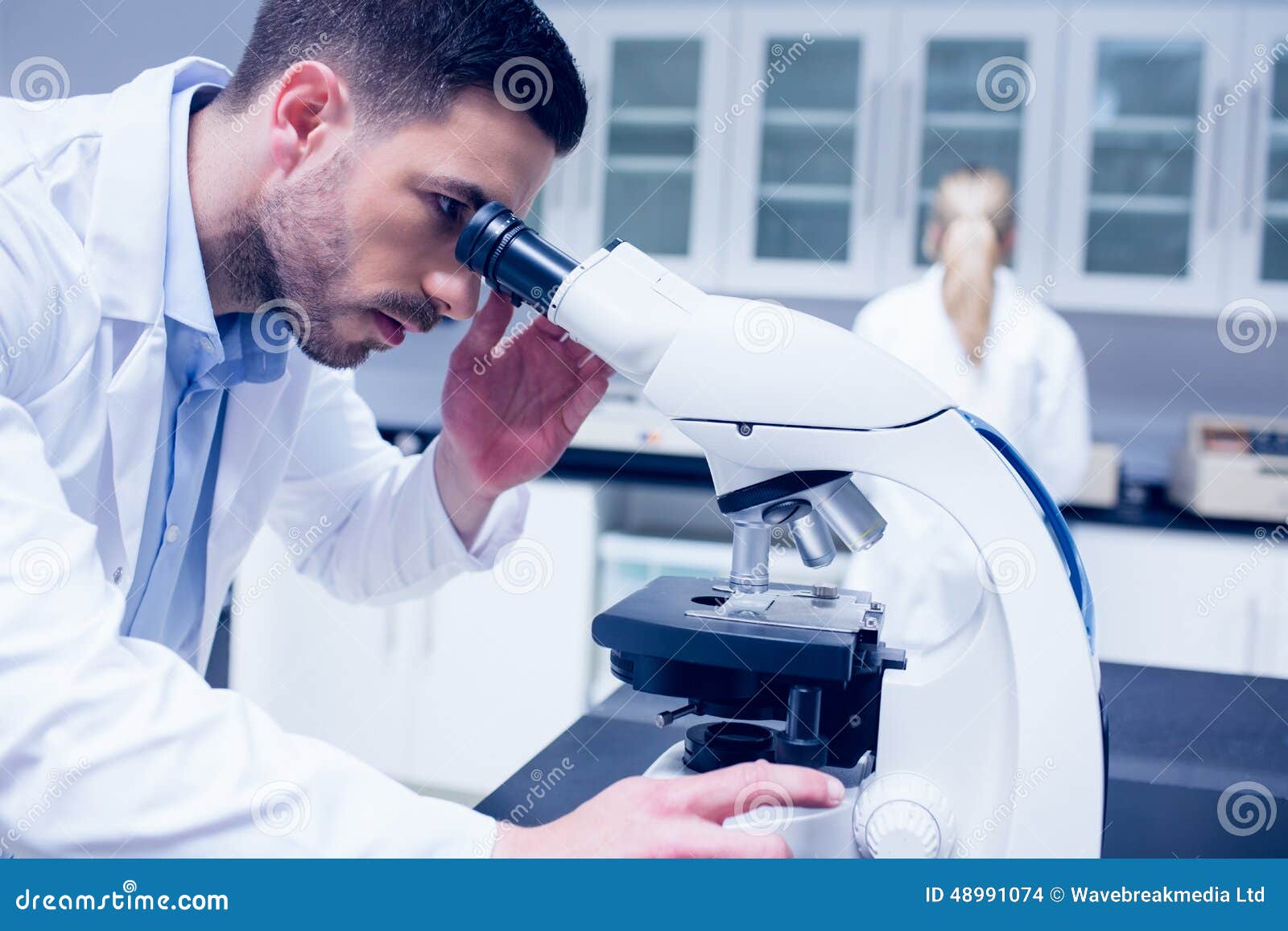 Science Student Working with Microscope in the Lab Stock Photo - Image ...
