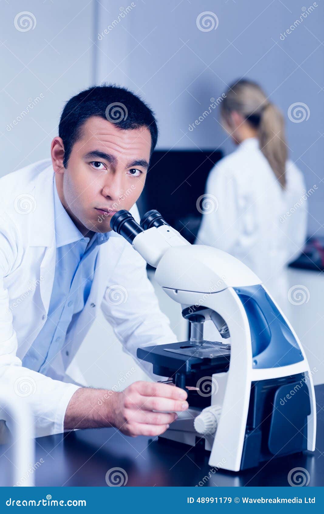 Science Student Working with Microscope in the Lab Stock Image - Image ...