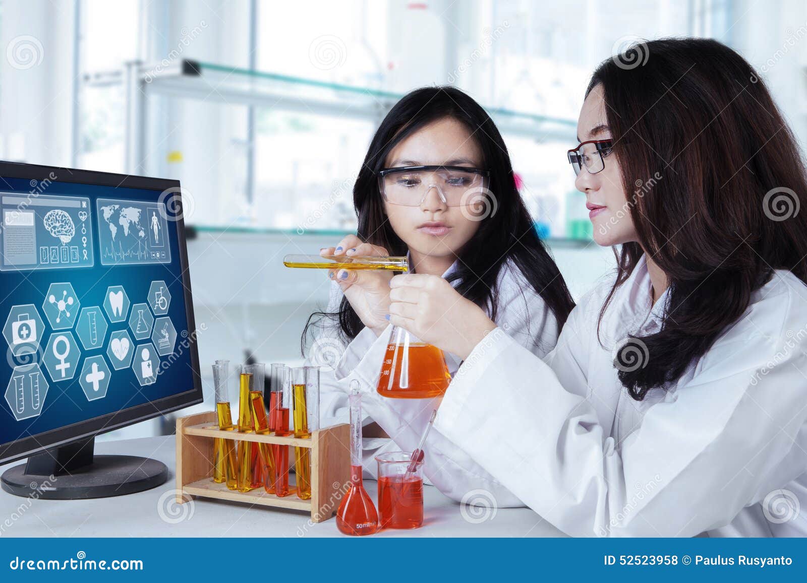 Science Students Doing Experiment Stock Photo - Image of holding ...