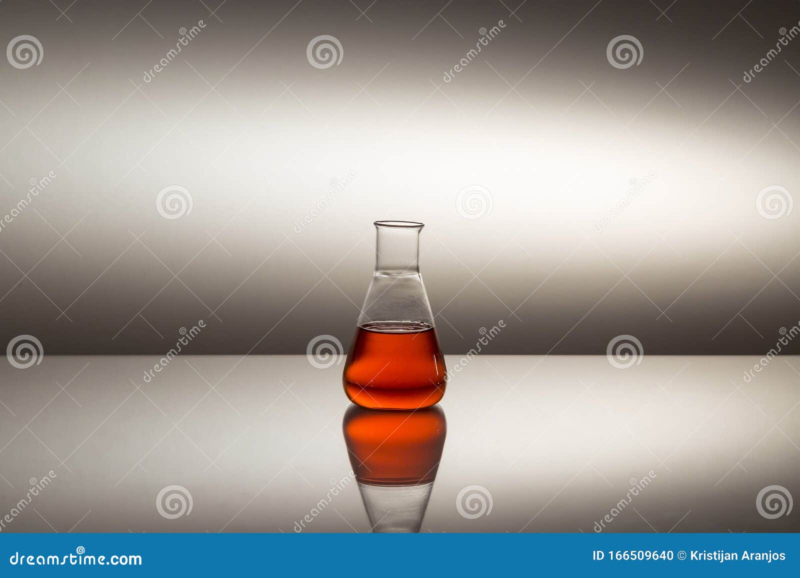 Scientific Laboratory Glass Erlenmeyer Flask Filled with Red Liquid on ...