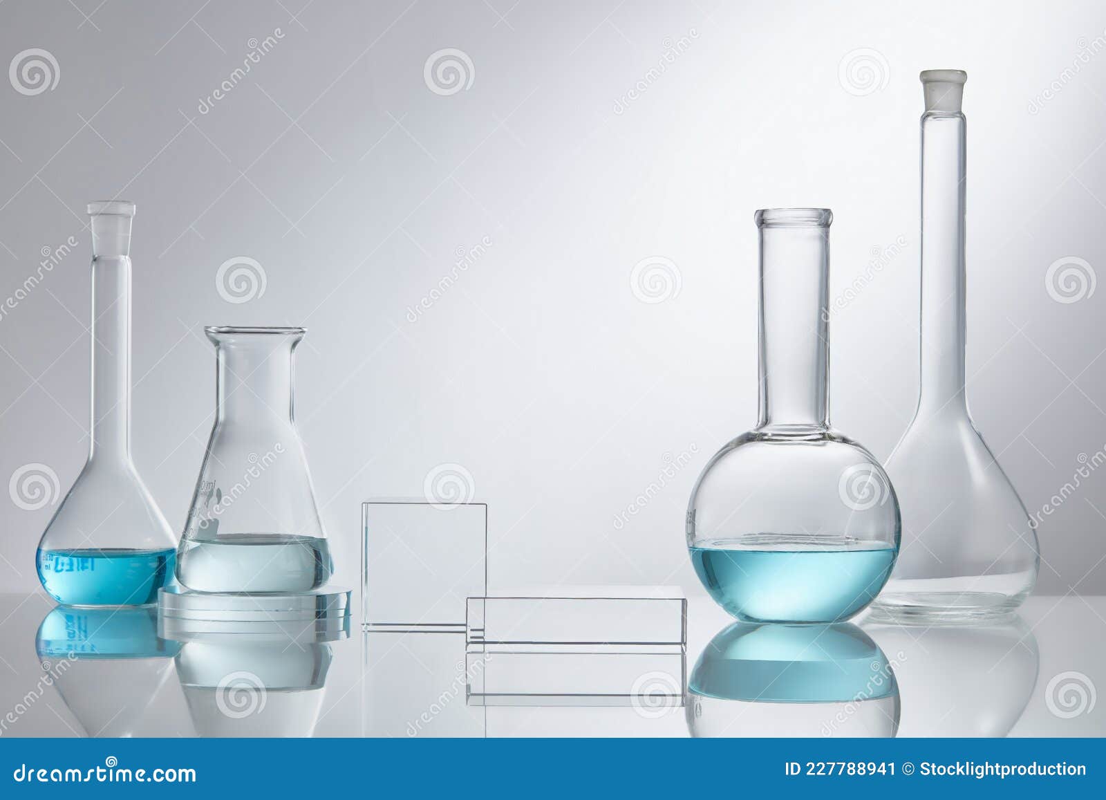 Scientific Laboratory Glassware Group with Transparent Liquid Solution ...