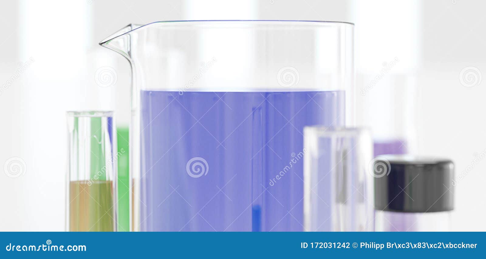 Scientific Laboratory Graduated Cylinder and Flasks Full of Chemical ...