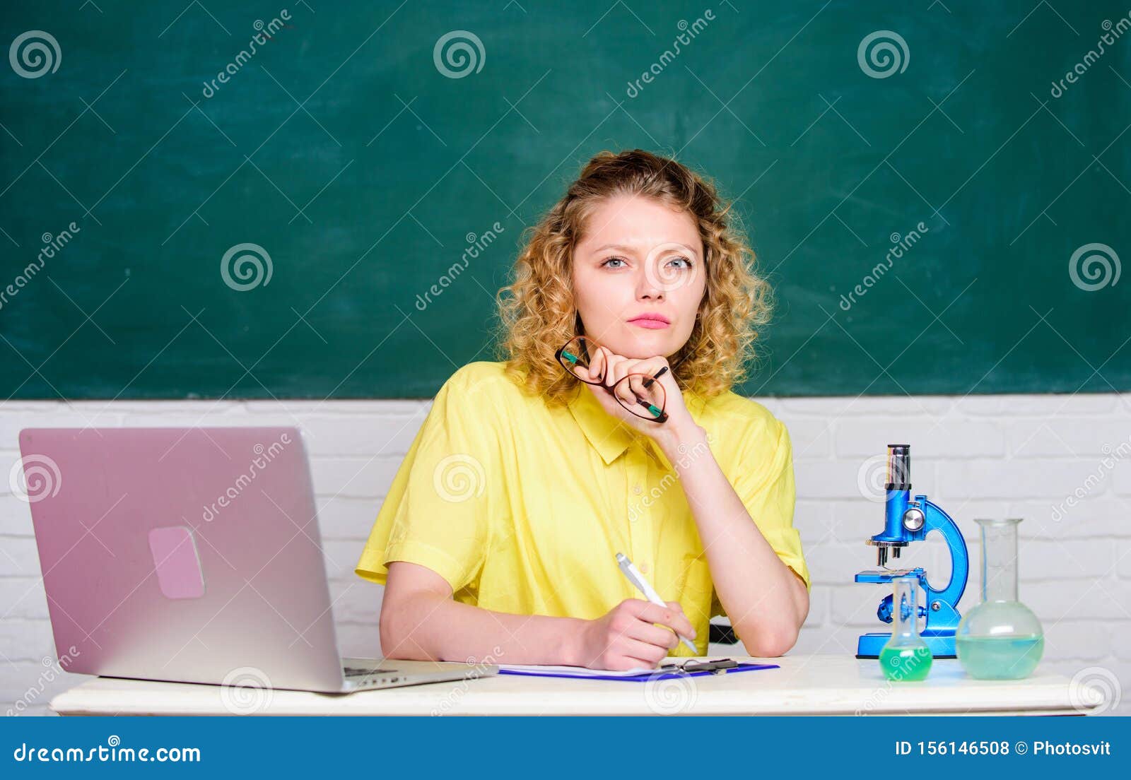 Scientific Research. Student Girl with Laptop and Microscope. Study ...