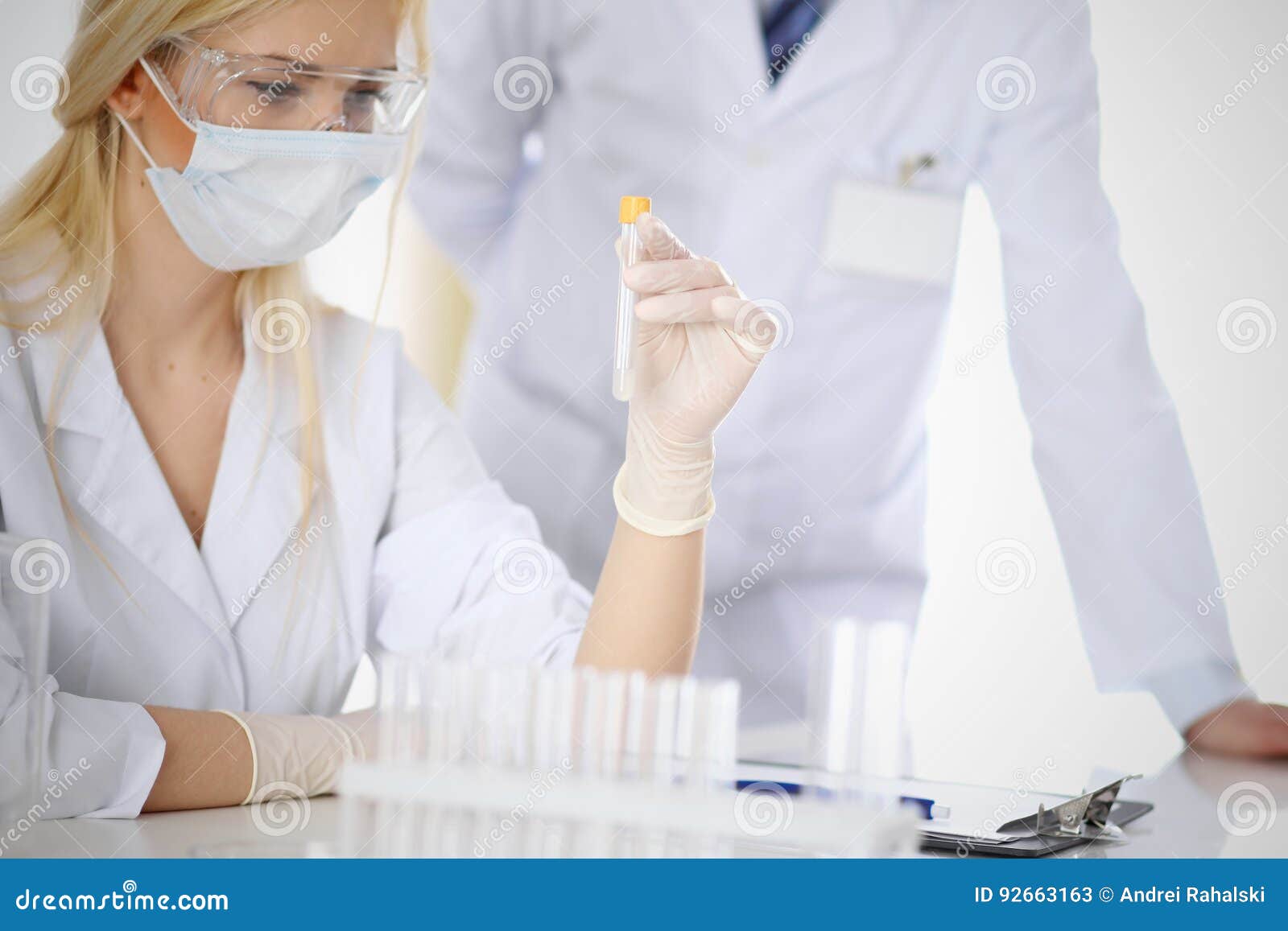 Scientific Research Team with Clear Solution in Laboratory Stock Image ...