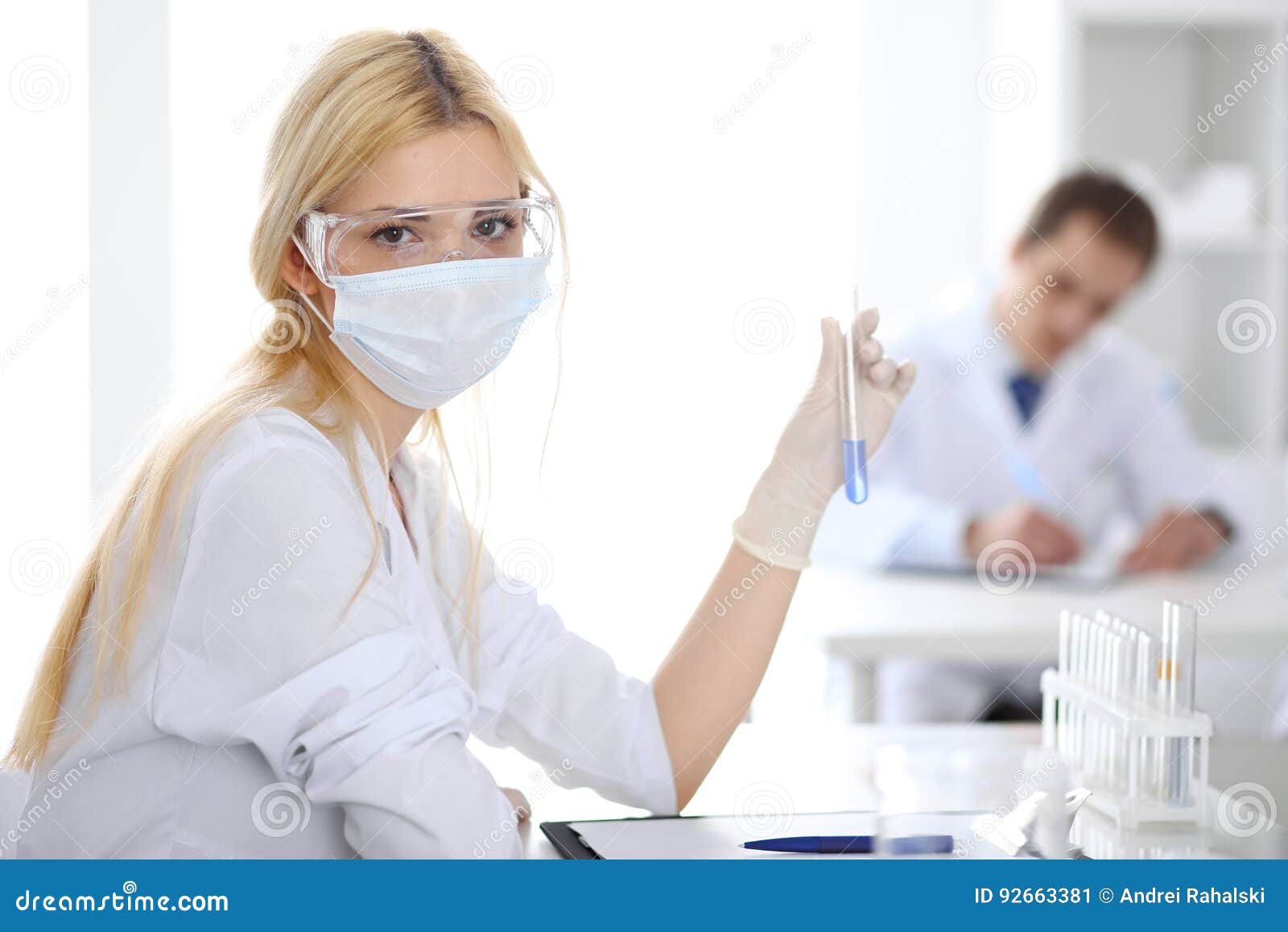Scientific Research Team with Clear Solution in Laboratory Stock Image ...