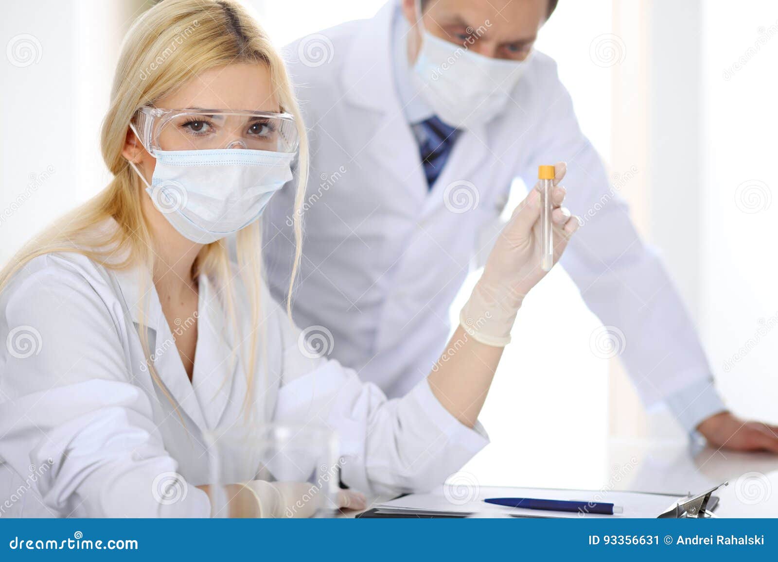 Scientific Research Team with Clear Solution in Laboratory Stock Image ...