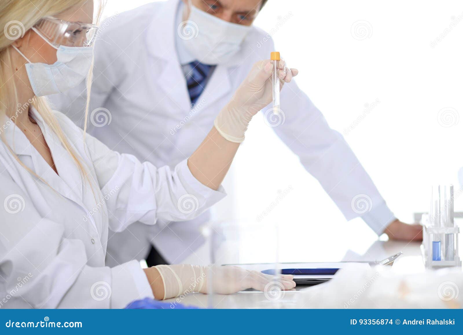 Scientific Research Team with Clear Solution in Laboratory Stock Photo ...