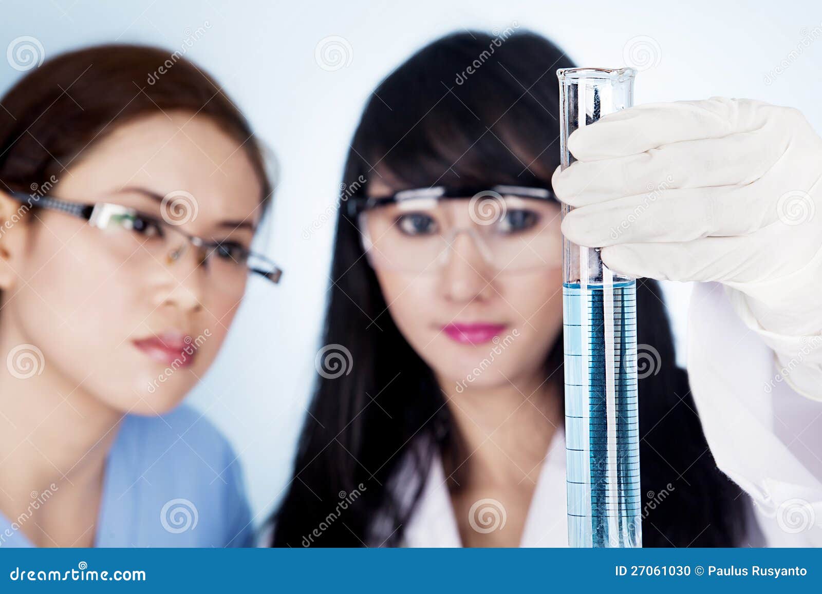 Scientific Research Team Looking at Clear Solution Stock Photo - Image ...