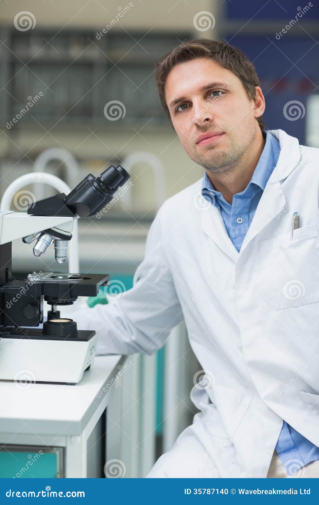 Scientific Researcher with Microscope in the Laboratory Stock Photo ...