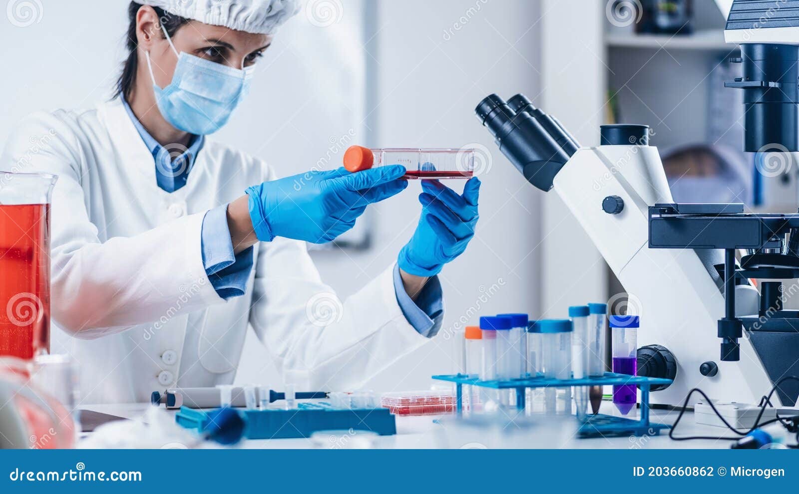 Scientist Analyzing Cultured Artificial Meat Sample Under the ...