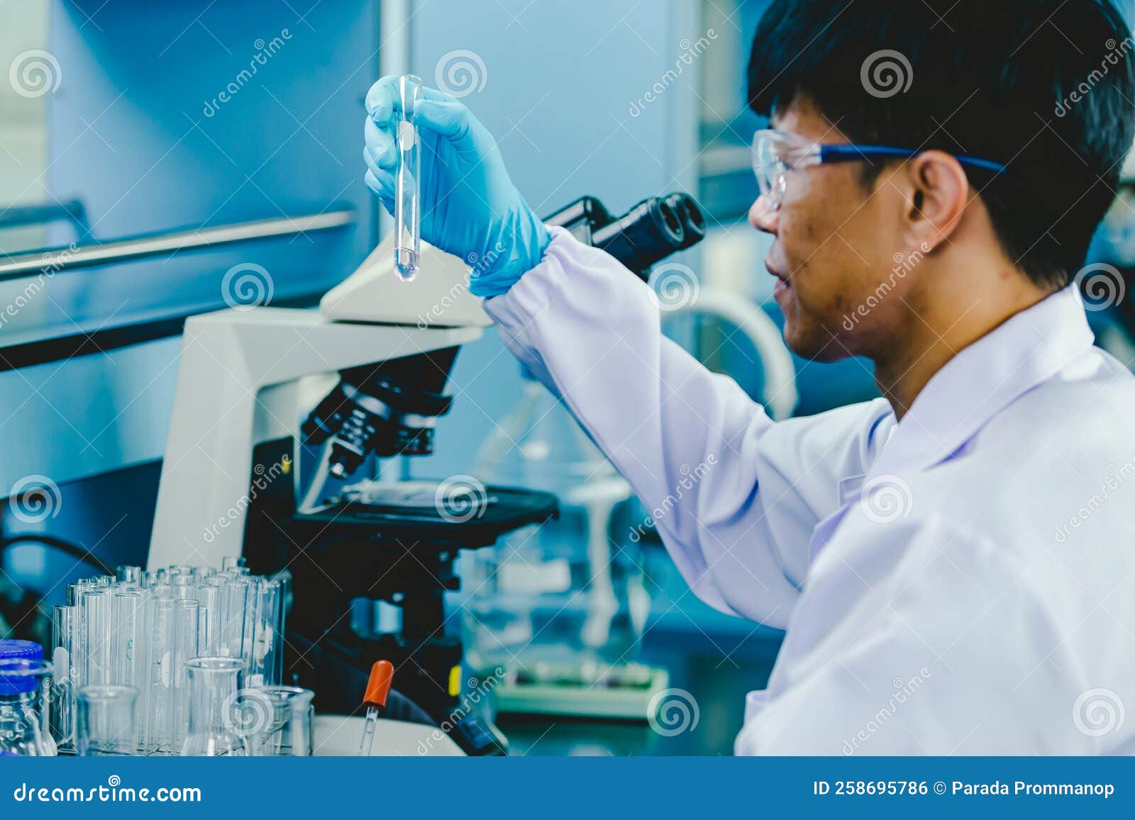 Scientist Analyzing Medical Sample in Laboratory Stock Photo - Image of ...