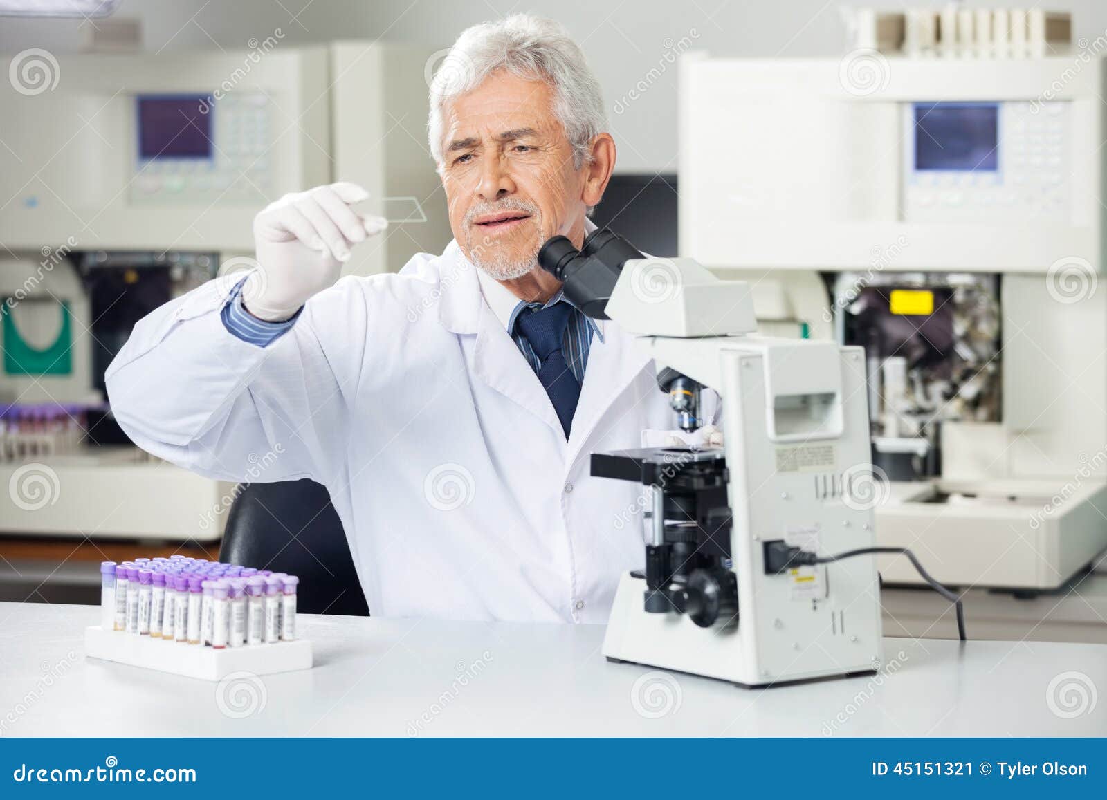 Scientist Analyzing Microscope Slide in Lab Stock Image - Image of ...