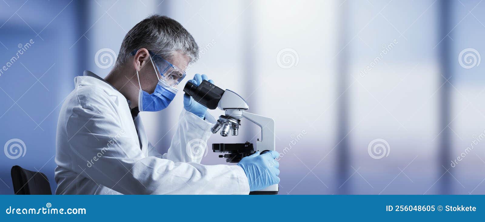 Scientist Analyzing Samples Under the Microscope Stock Image - Image of ...