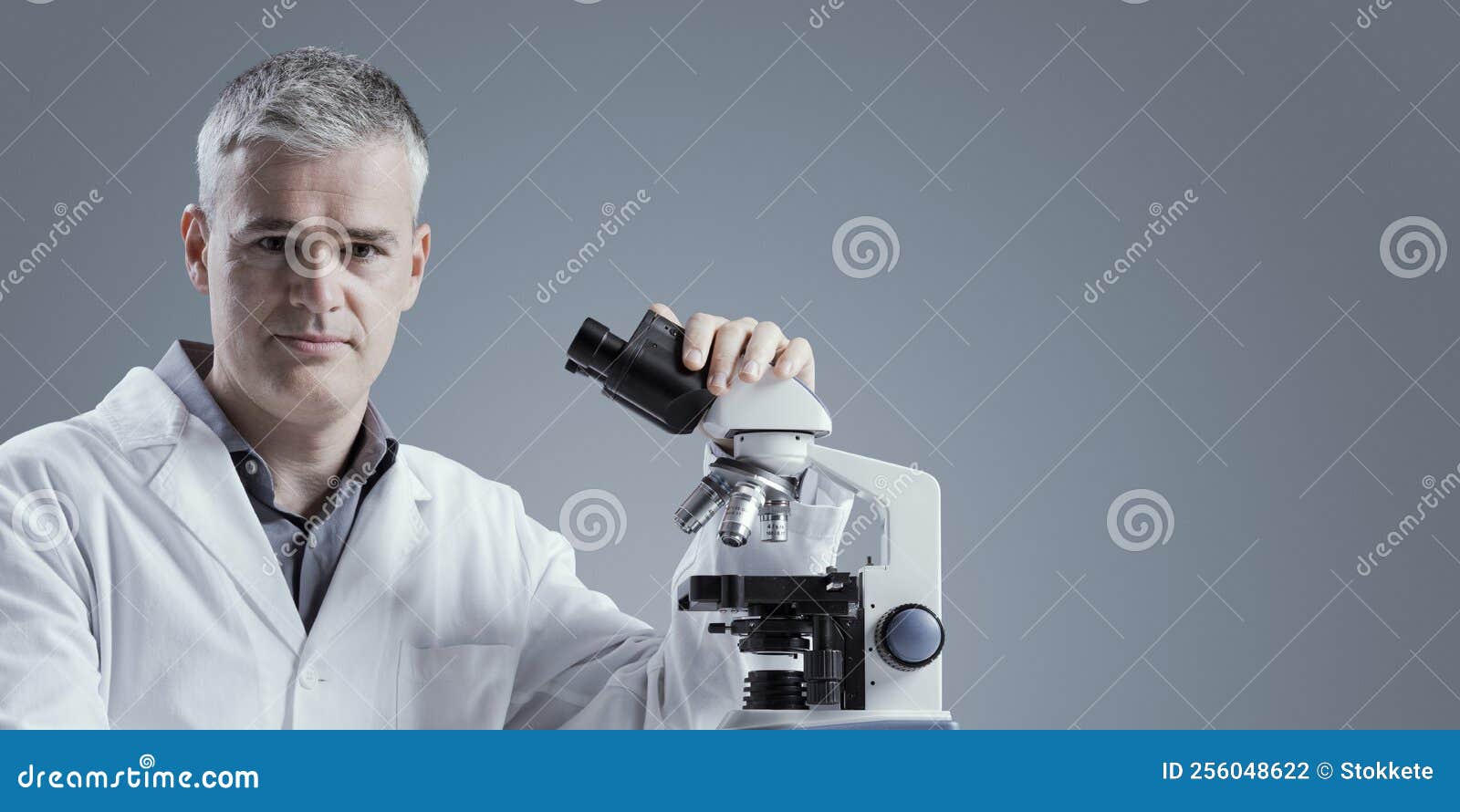 Scientist Analyzing Samples Under the Microscope Stock Photo - Image of ...