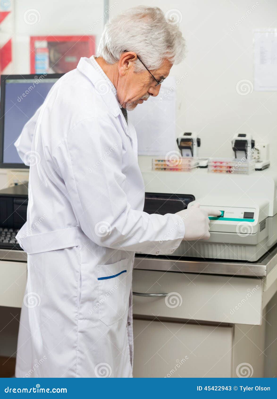 Scientist Analyzing Samples Using Analyzer Stock Image - Image of ...